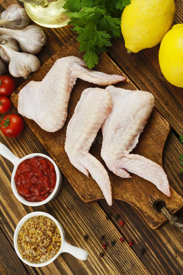 Raw chicken wings stock photo. Image of pepper, ingredient - 77375140