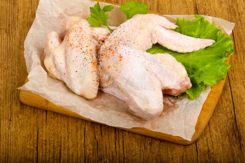 Raw chicken wings stock photo. Image of bone, pink, freshness - 117906650
