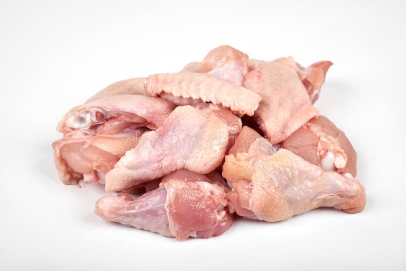 Raw Chicken Wings on Cutting Board on White Background. Stock Photo ...