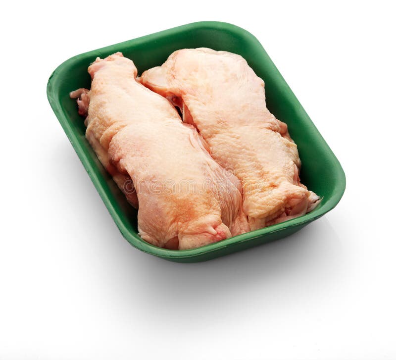 Raw Chickens Breast in a Green Tray Over White Background Stock Image ...
