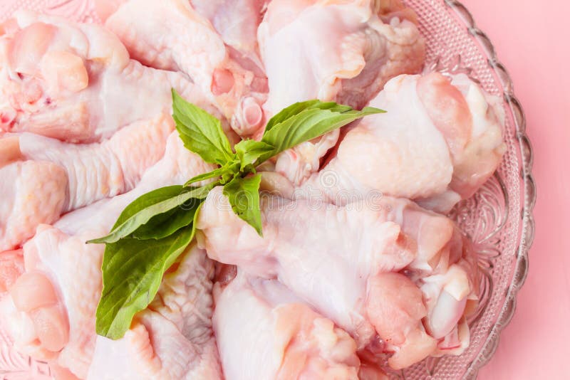 Raw chickens on plate stock photo. Image of meat, thigh - 49486710