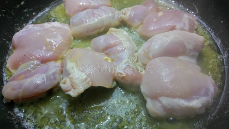 Raw Chopped Chicken Breasts in Butter Stock Photo - Image of sizzling ...