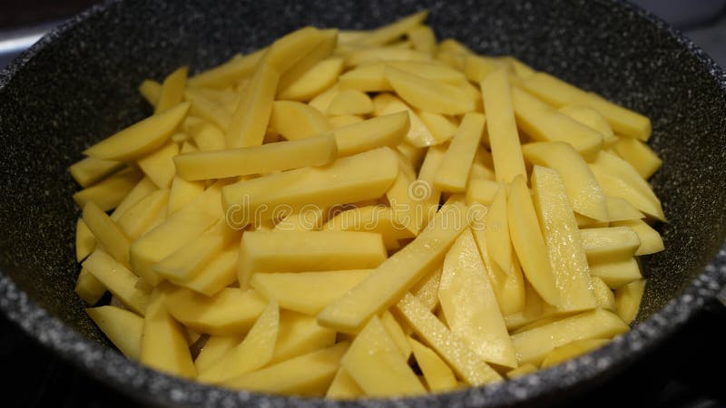 Raw Chopped Potatoes Cooked for Frying in a Pan Stock Image - Image of ...