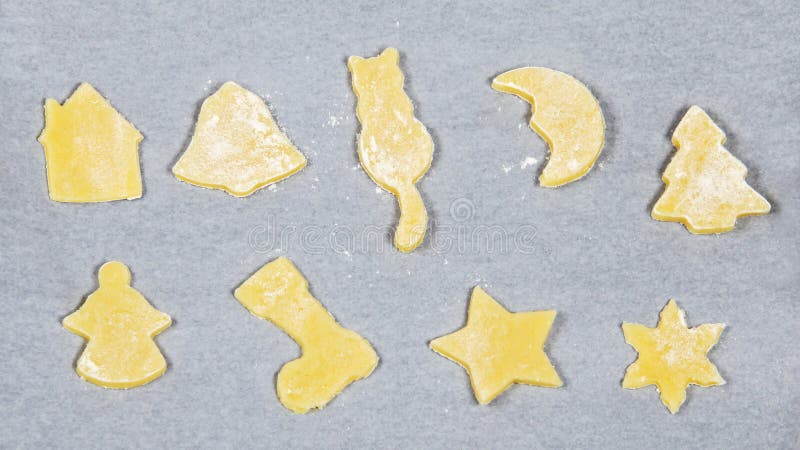 Raw Christmas Cookies on Parchment Paper Ready for Baking Stock Image ...