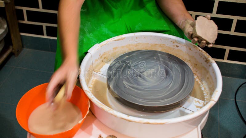 A Raw Clay Pot in the Hands of a Potter. Workshop in the Pottery ...