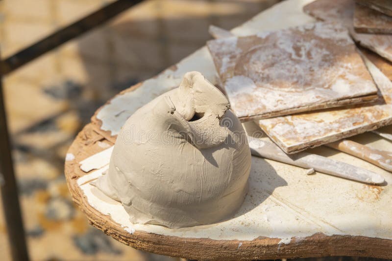 Raw Clay for Pottery Modeling with a Putty Knife and Molding Tools ...