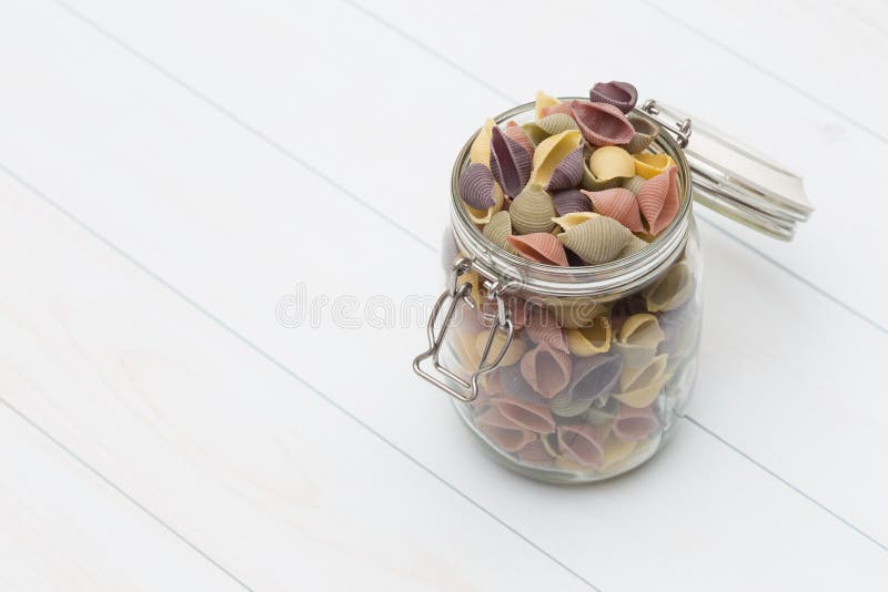 Raw Cocciolette Pasta on a Glass Jar Stock Image - Image of inside ...