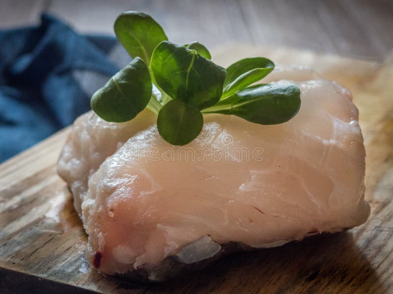 Cod on a table stock photo. Image of fillet, cooking - 142198216