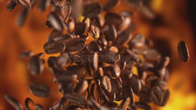 Raw Coffee Beans Flying on the Fire in 4K Stock Video - Video of ...