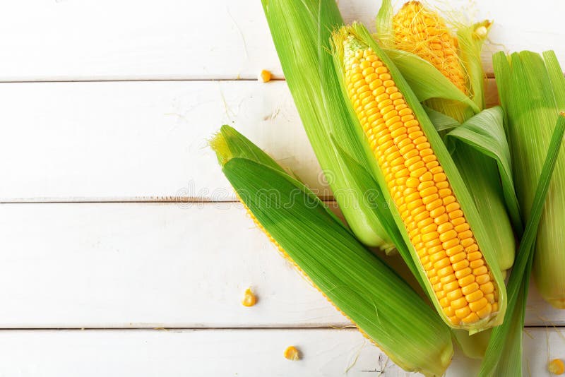 Raw Corn on a Wooden Table. Close Up. Stock Image - Image of leaf ...