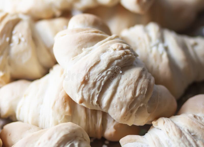 Raw Croissant Rolls in Baking Process Stock Photo - Image of cuisine ...