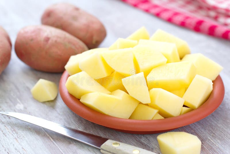 Raw cutted potatoes stock photo. Image of dish, food - 63881700