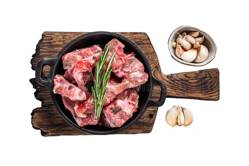 Raw Diced Meat Cubes with Bone in a Pan. Isolated, White Background ...
