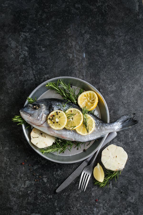 Raw Dorado Fish with Spices. Dorado and Ingredients for Cooking on a ...