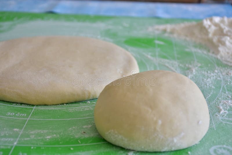 Raw dough on the table. stock image. Image of background - 164355805