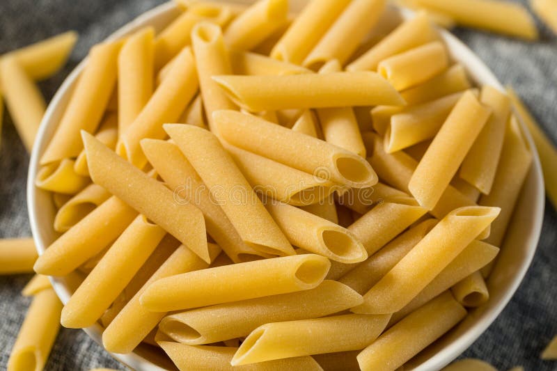 Raw Dry Mostaccioli Penne Lisce Pasta Stock Photo - Image of food ...
