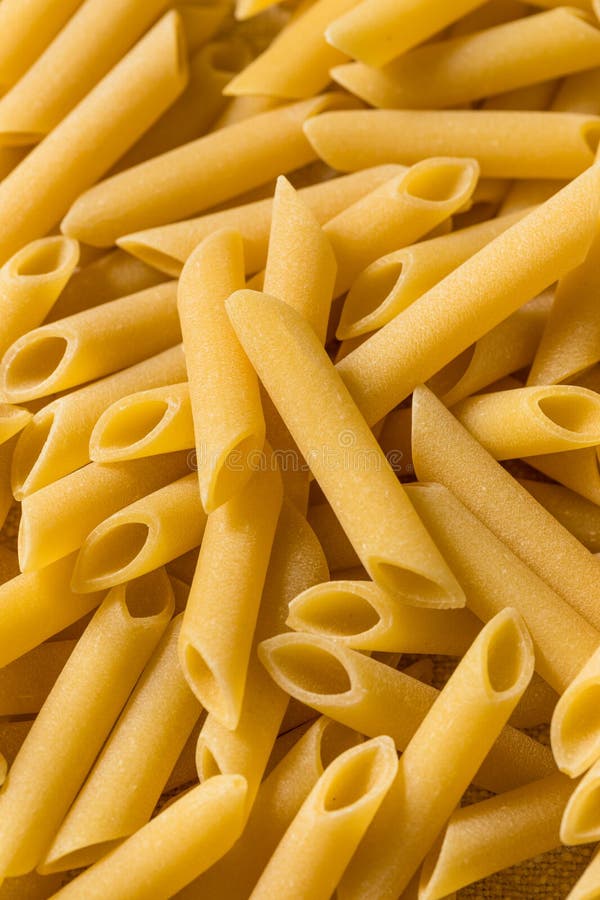 Raw Dry Mostaccioli Penne Lisce Pasta Stock Image - Image of yellow ...