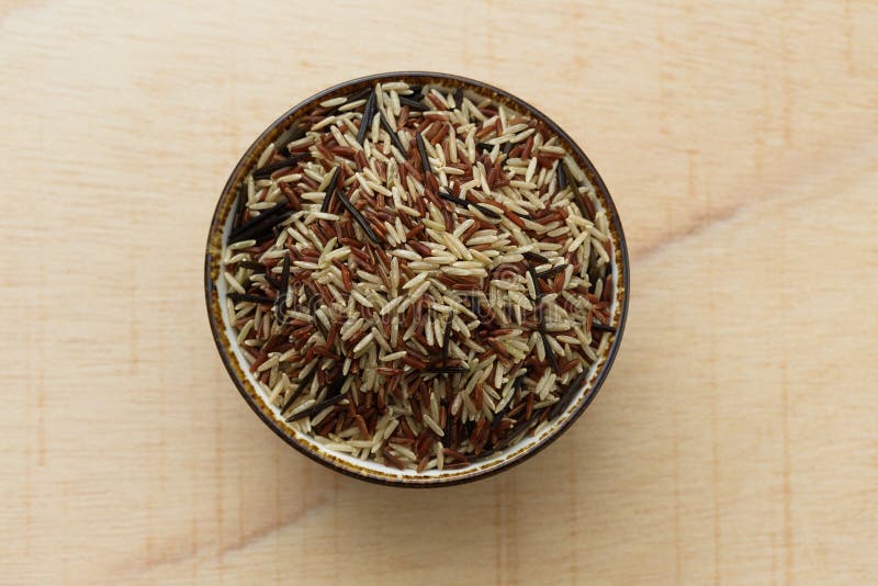 Raw Dry Organic Wild Rice in a Bowl Stock Photo - Image of nature ...