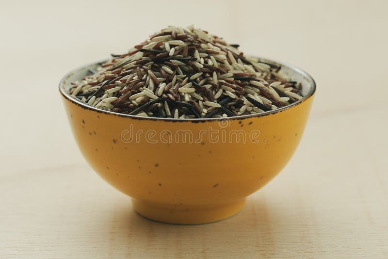 Raw Dry Organic Wild Rice in a Bowl Stock Photo - Image of food, fiber ...