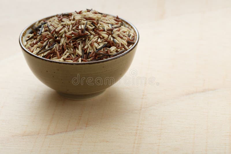 Raw Dry Organic Wild Rice in a Bowl Stock Photo - Image of ingredient ...