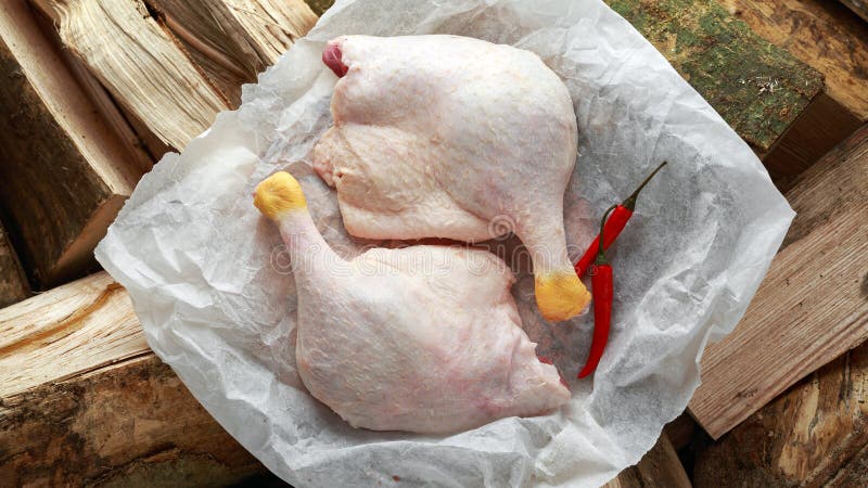 Raw Duck Legs with Chilli on Firewood. Rustic Style Stock Photo - Image ...