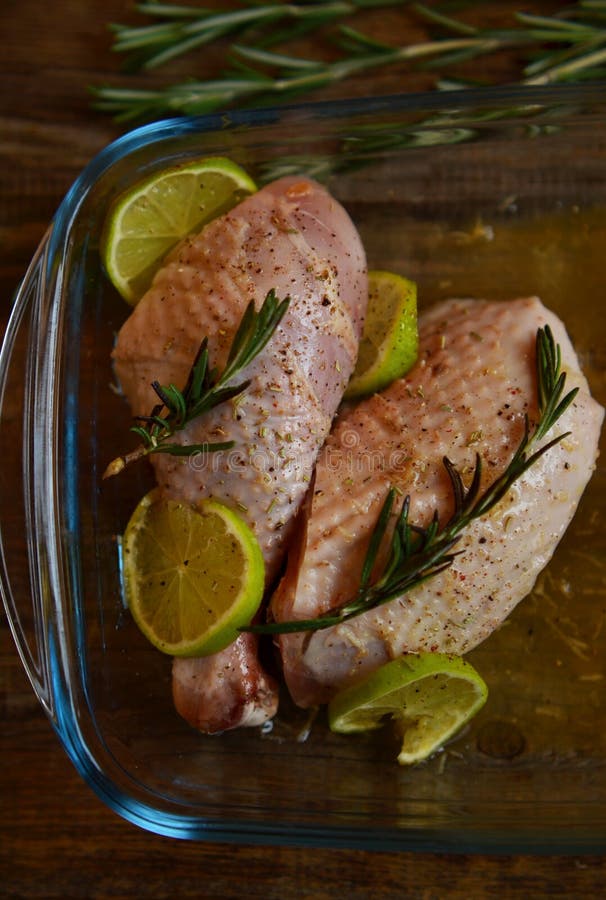 Raw Duck Legs with Rosemary and Lime Stock Photo - Image of legs, duck ...