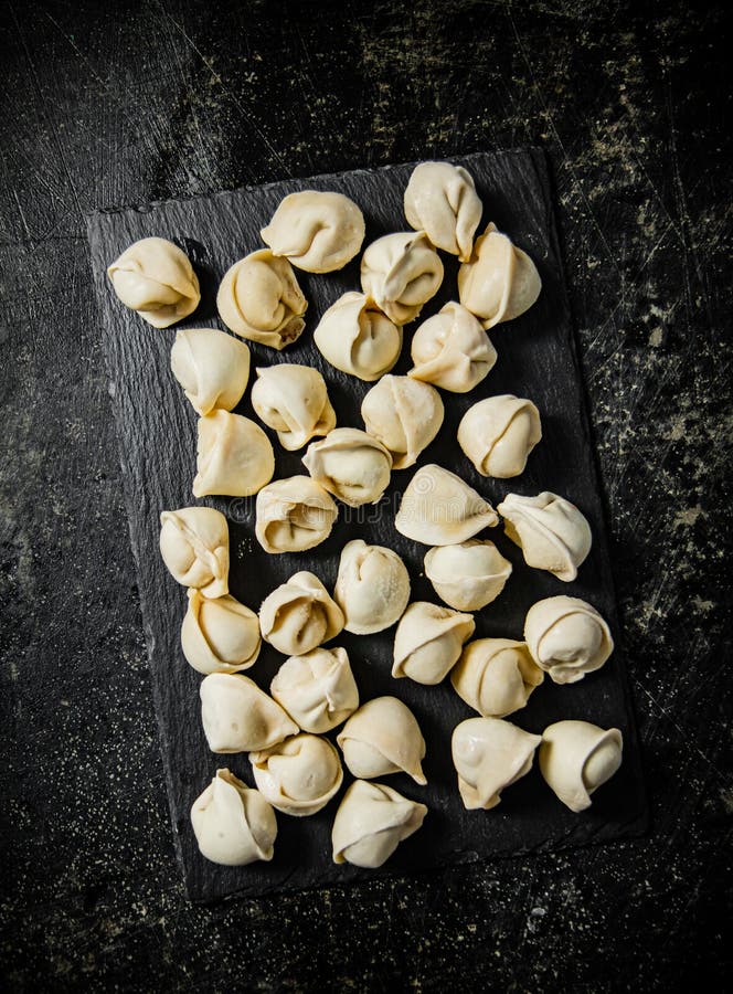 Raw Dumplings on a Stone Board. Stock Photo - Image of cuisine, dinner ...