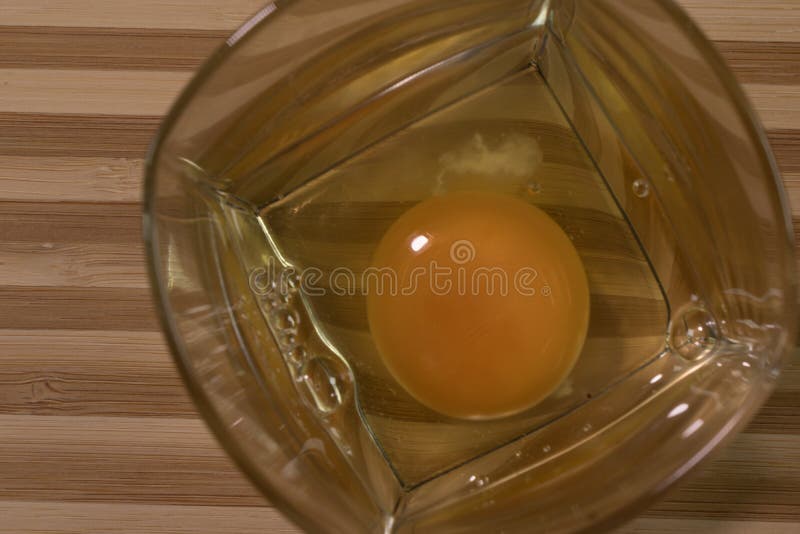 Raw Egg in Glass Beaker. on the Desk Stock Image - Image of cuisine ...