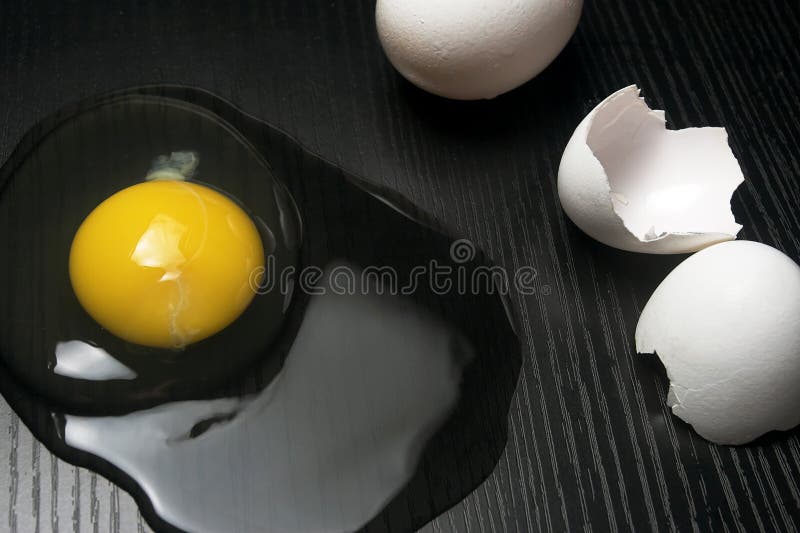 Raw egg and shells stock photo. Image of ingredient, yolk - 2401490