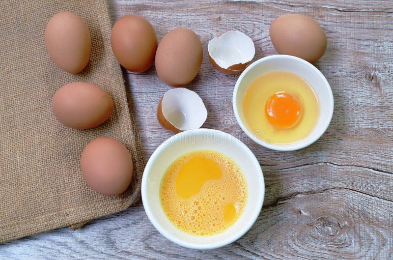 Crack Egg and uncooked egg stock photo. Image of closeup - 46018850