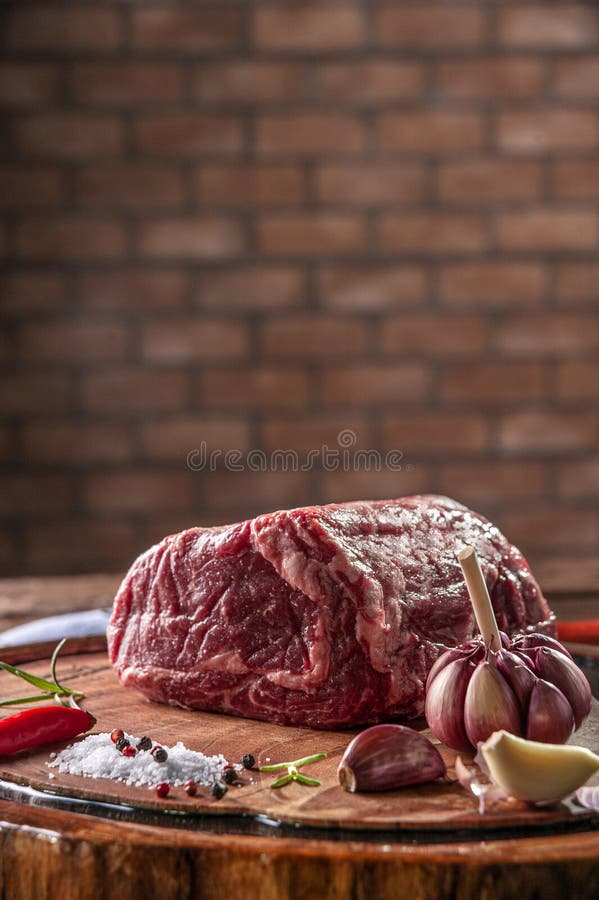 Raw Entrecote Beef on a Wood Cutting Board Stock Image - Image of board ...