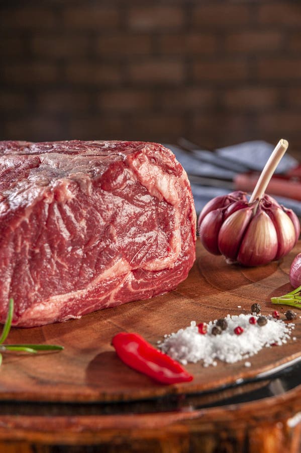 Raw Entrecote Beef on a Wood Cutting Board Stock Photo - Image of ...