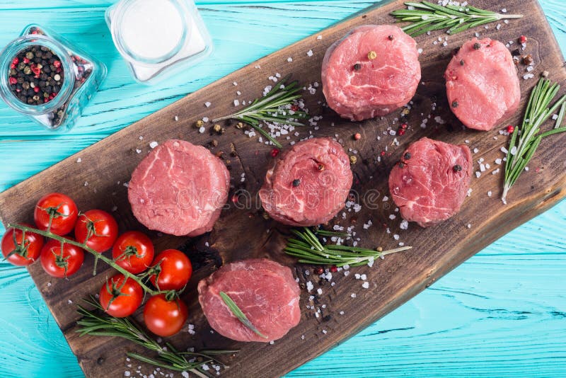 Raw filet mignon stock image. Image of herb, board, salt - 149086231