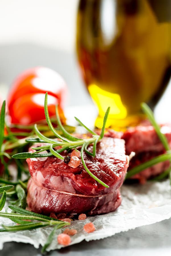 Raw filet mignon stock photo. Image of tomato, peppercorns - 62391722