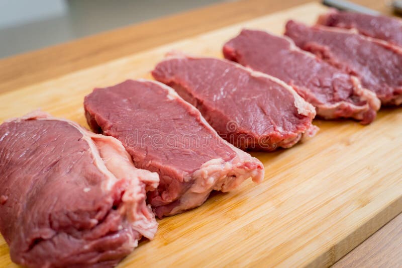 Raw Fillet Beef Meat for Steaks on the Cutting Board Stock Image ...