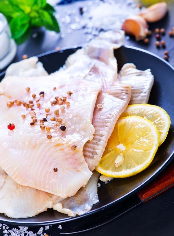 Raw fish stock photo. Image of cooking, lemon, cutting - 72301312