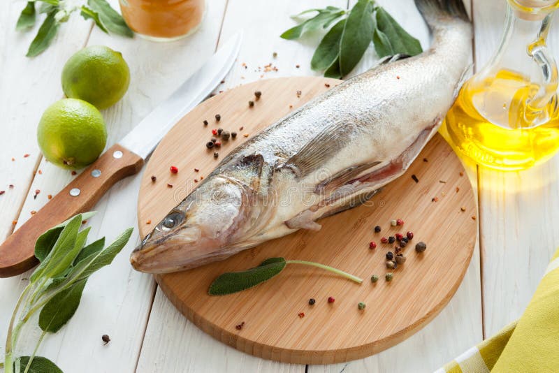 Raw Fish Close-up on a Cutting Board Stock Image - Image of lemon ...