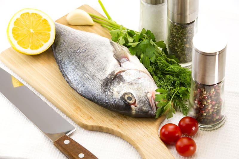 Raw Fish on a Cutting Board Stock Image - Image of food, kitchen: 45374235