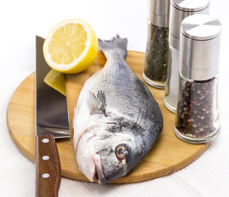 Raw Fish on a Cutting Board Stock Image - Image of food, dinner: 46331899