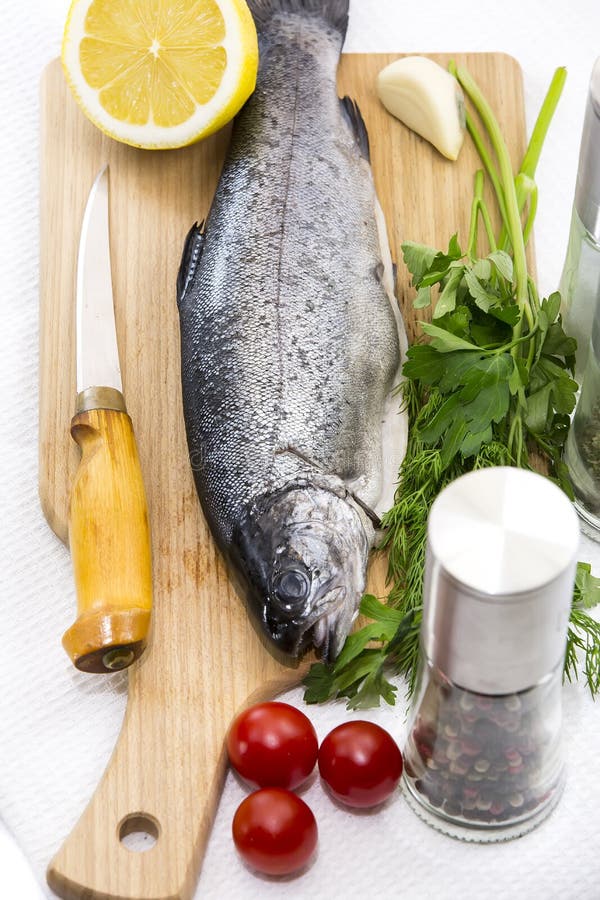Raw Fish on a Cutting Board Stock Photo - Image of cutting, organic ...