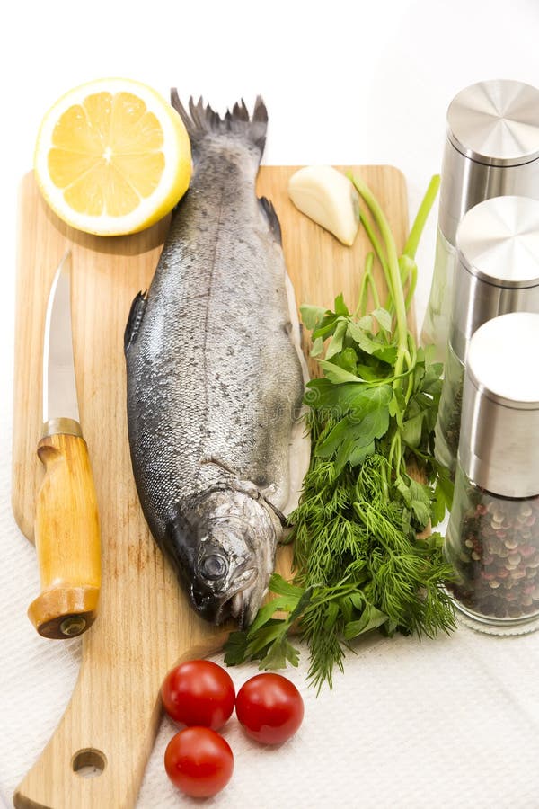 Raw Fish on a Cutting Board Stock Photo - Image of aquaculture, fish ...
