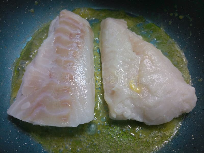 Sizzling Hot Cod Fish Frying Stock Photo - Image of butter, sizzling ...