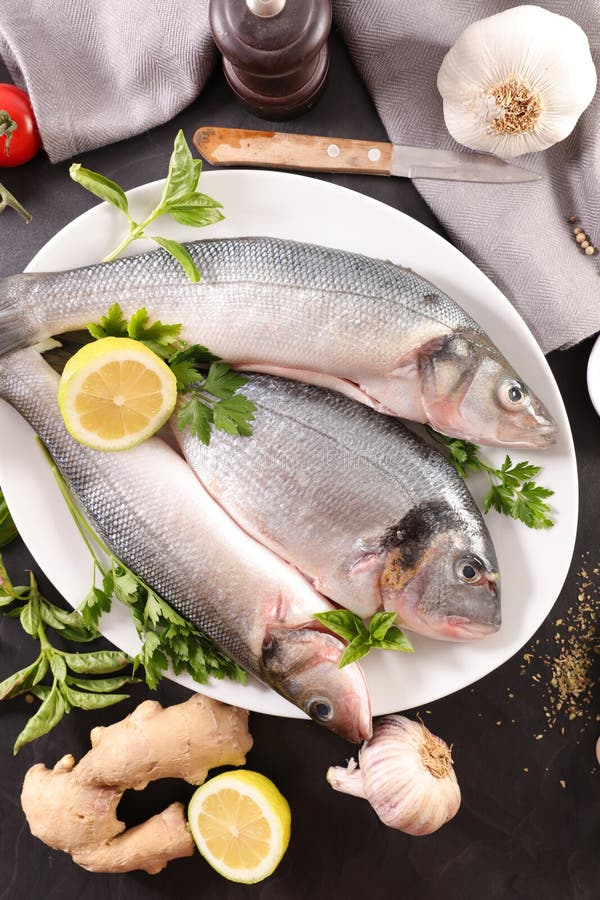 Raw fish with ingredient stock image. Image of cooking - 177933995