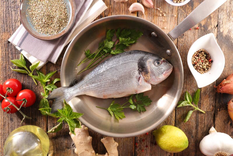 Raw fish and ingredients stock photo. Image of cuisine - 120574902