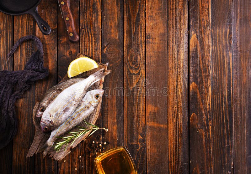 Raw Fish with Salt and Spice Stock Photo - Image of isolated, people ...