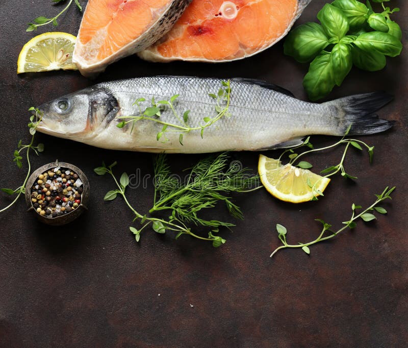Raw Fish Sea Bass and Salmon with Lemon Stock Photo - Image of meal ...