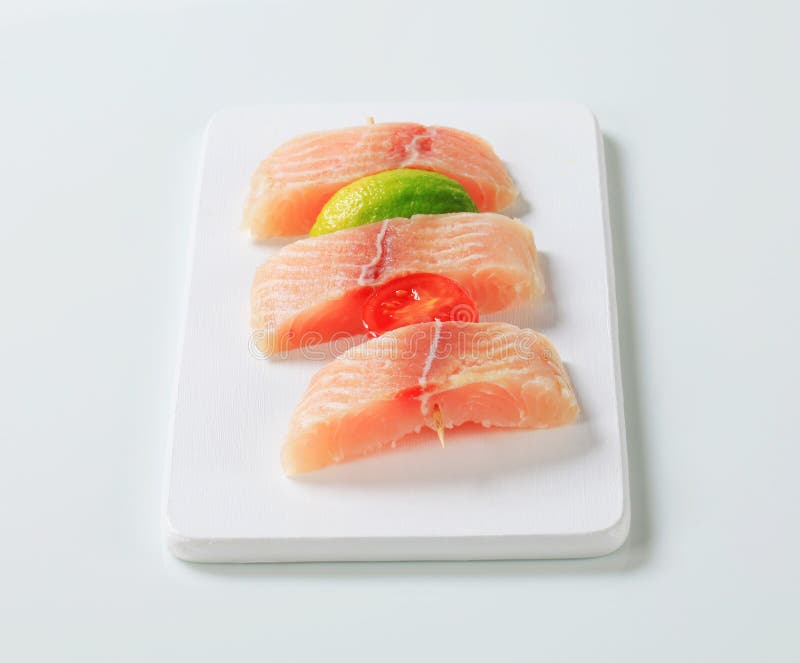 Raw fish skewer stock photo. Image of white, board, lime - 53733862