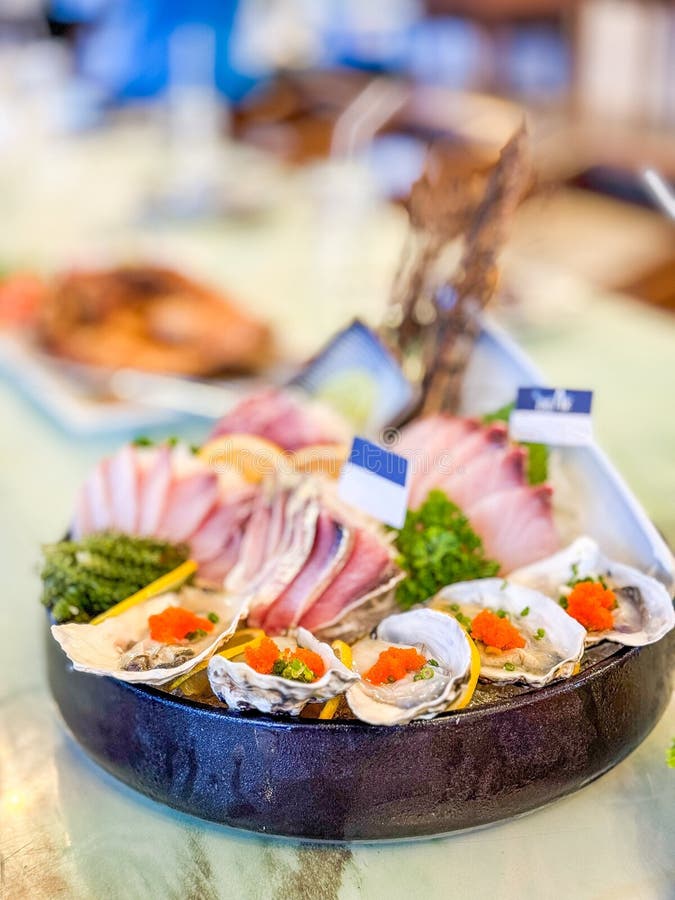 Raw Fish Slice and Oyster Serve on the Table Stock Photo - Image of ...