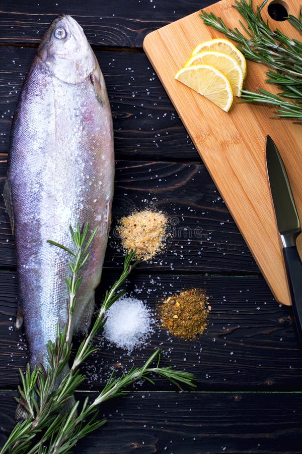 Raw fish with spices stock photo. Image of table, lunch - 82324824