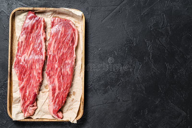 Raw Flank Steak. Fillet of Marbled Beef. Black Background. Top View ...
